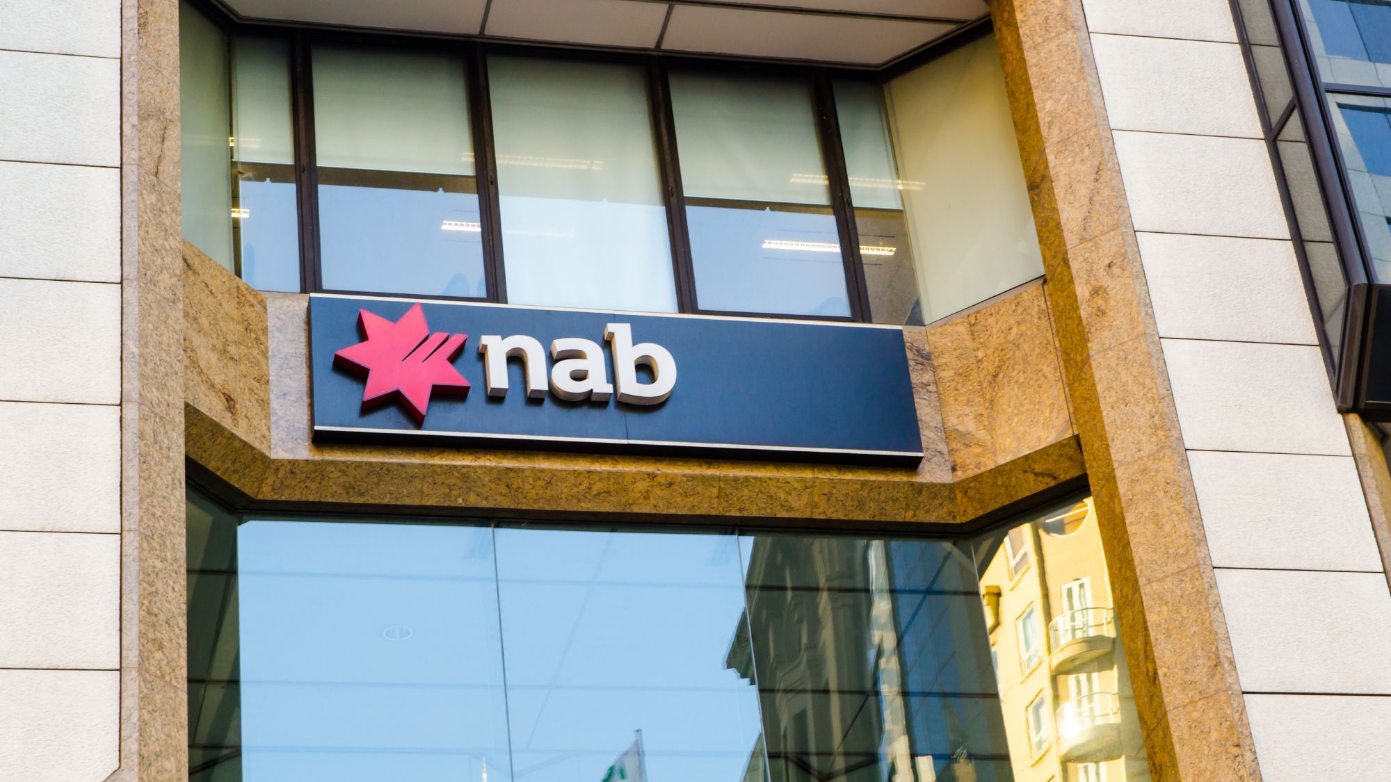 NAB fined $2.1m over wrongful payment fees - Money Management
